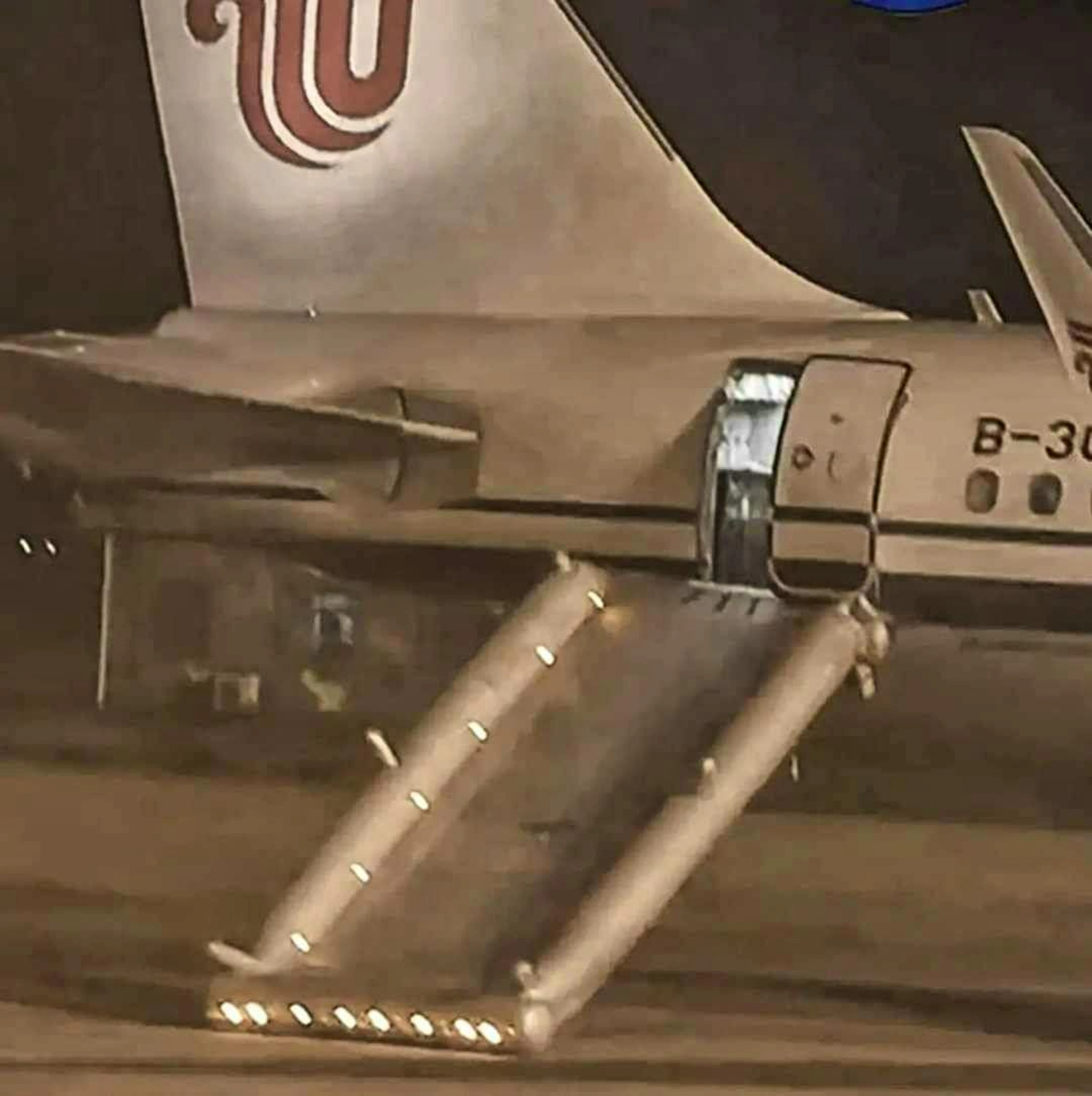 Woman activates emergency slide on airplane because she has to go to ...