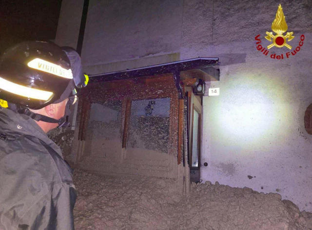 Severe storms in Italy - people trapped after landslide