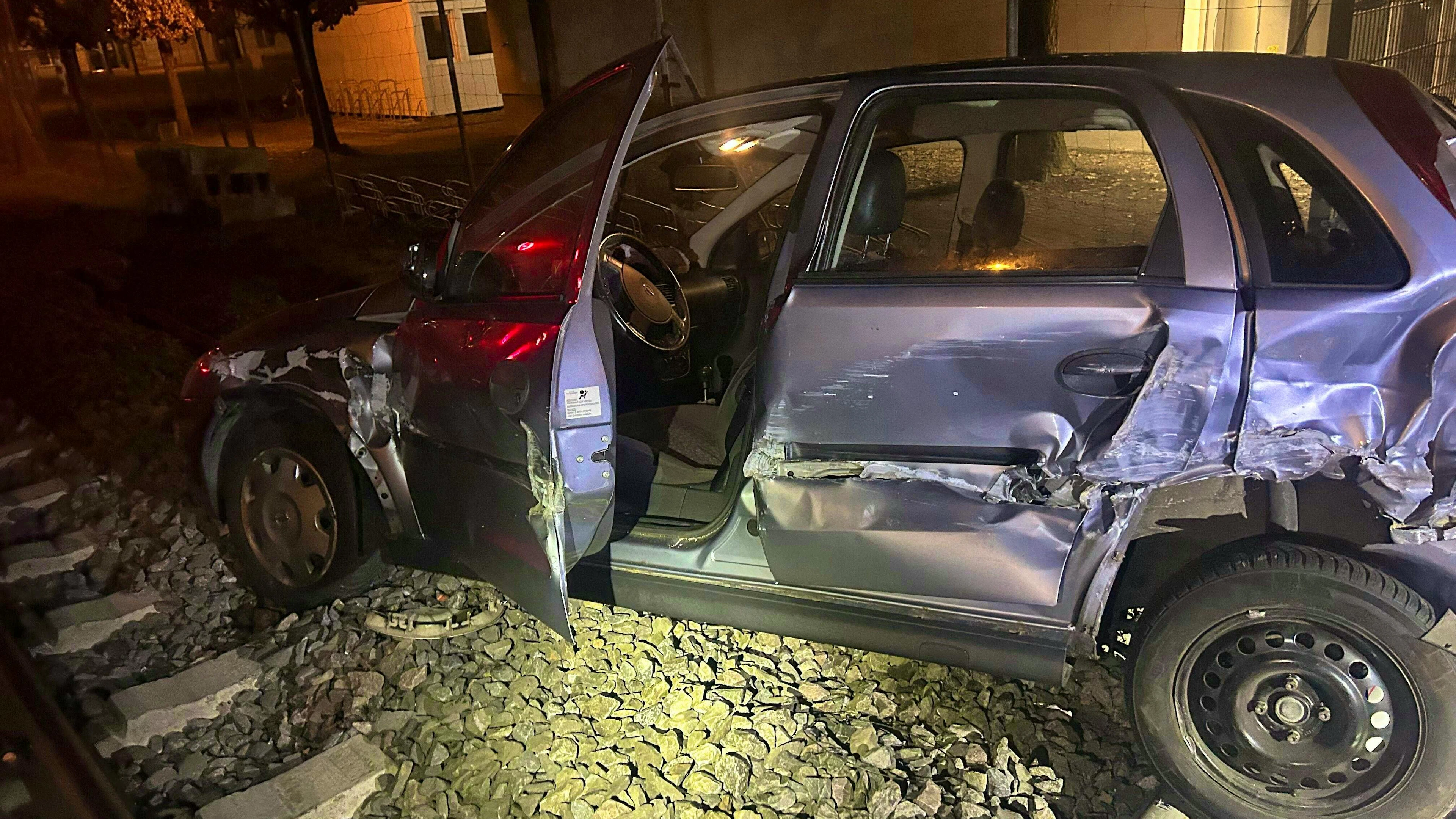 Car collides with train - driver flees