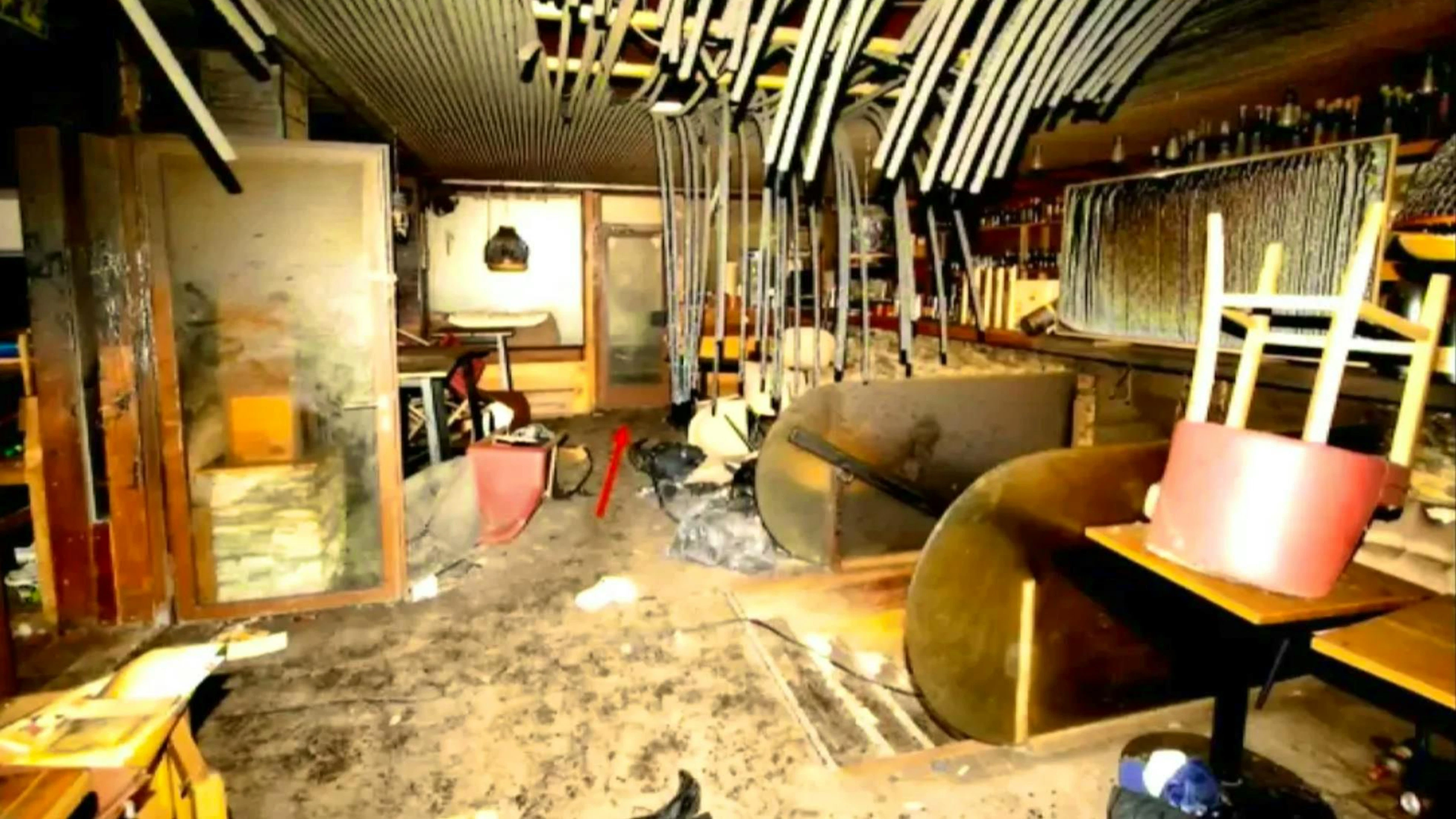 New pictures show the destruction in the bar - and raise questions
