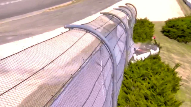 IndyCar star crashes through barrier - and remains uninjured