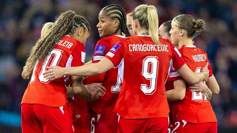 The Swiss celebrate Aurélie Csillag's goal to make it 2:1.